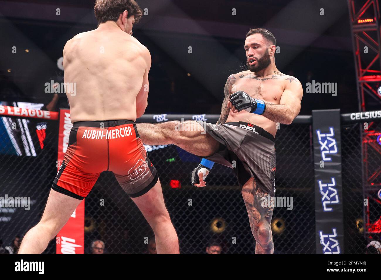 April 14, 2023: (R-L) Lightweight Shane Burgos kicks Olivier Aubin-Mercier during the PFL 3 ...