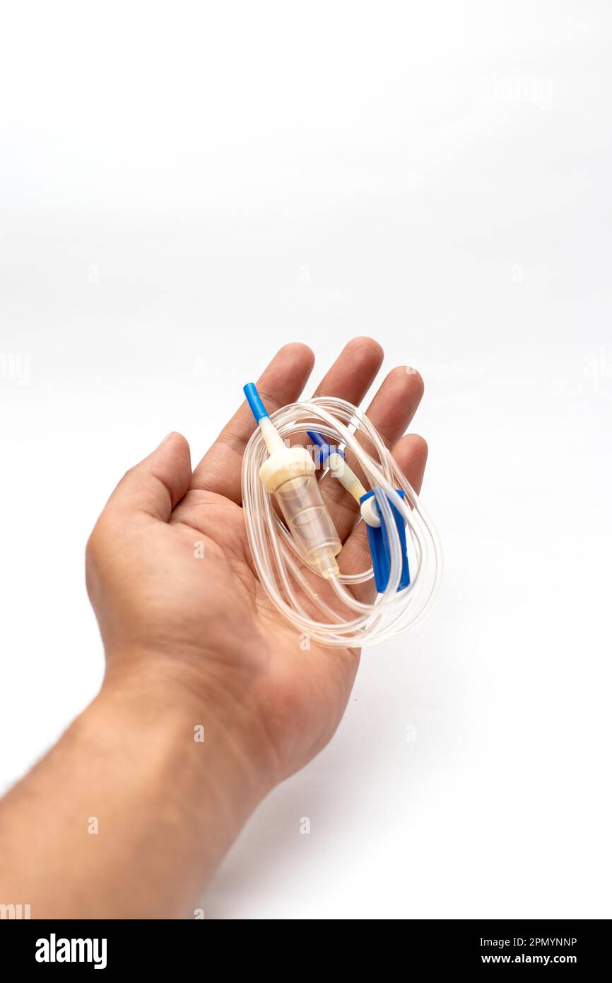 IV Infusion Set with Needle in hand Stock Photo - Alamy