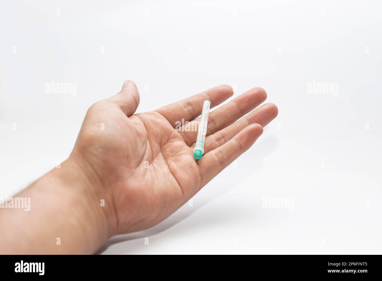 IV Infusion Set with Needle in hand Stock Photo - Alamy