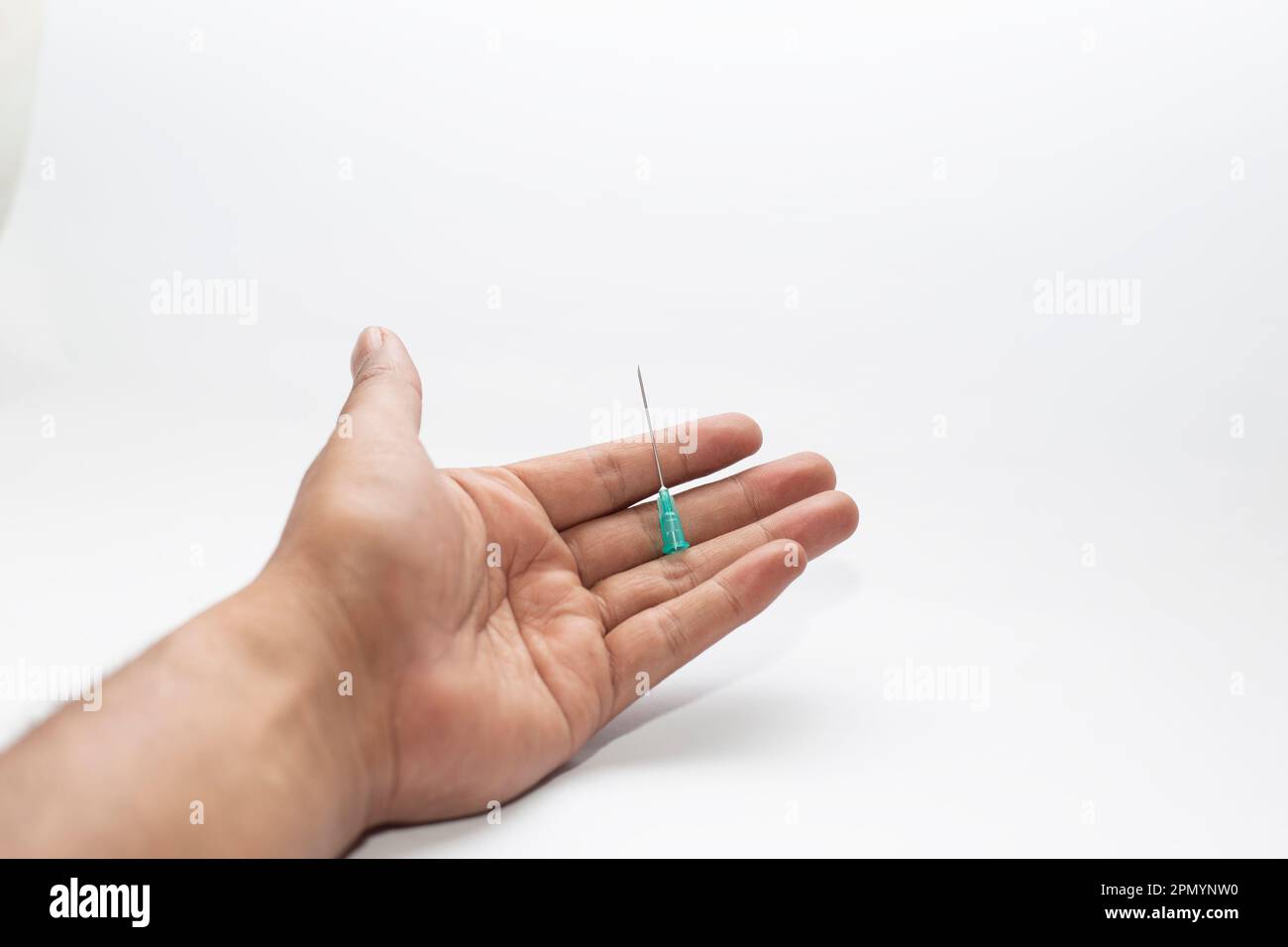 IV Infusion Set with Needle in hand Stock Photo - Alamy