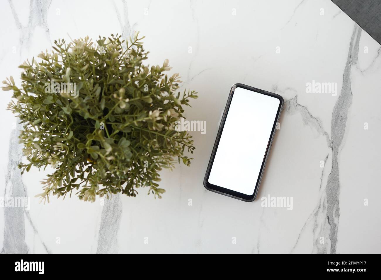 Blank screen cell phone with empty copy space mockup on tiles ...