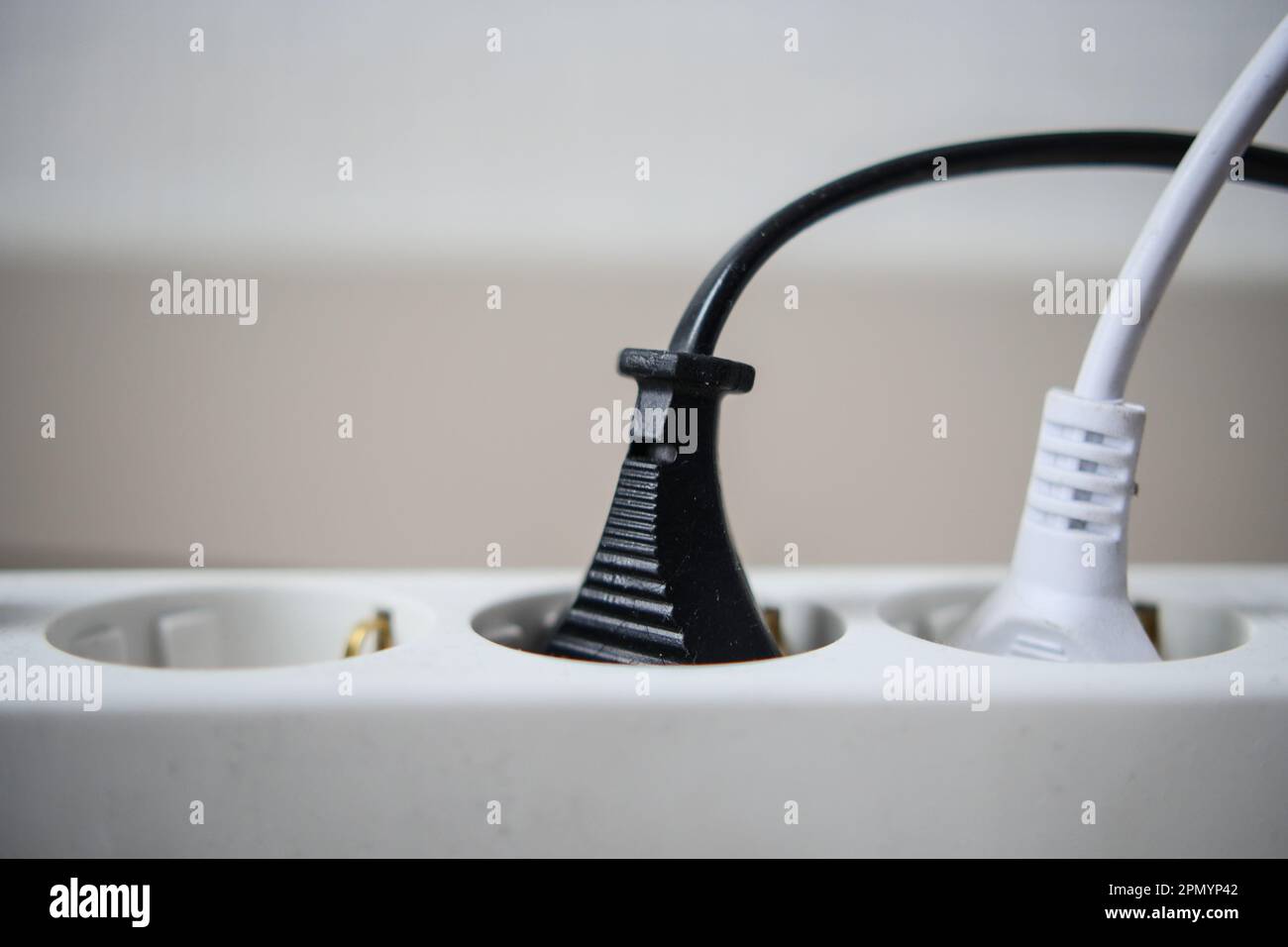 Electrical switch and plug on table Stock Photo - Alamy