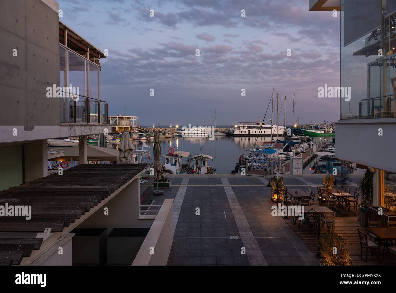 Limassol, Cyprus - March 23, 2023 - View over the old harbour at dusk ...
