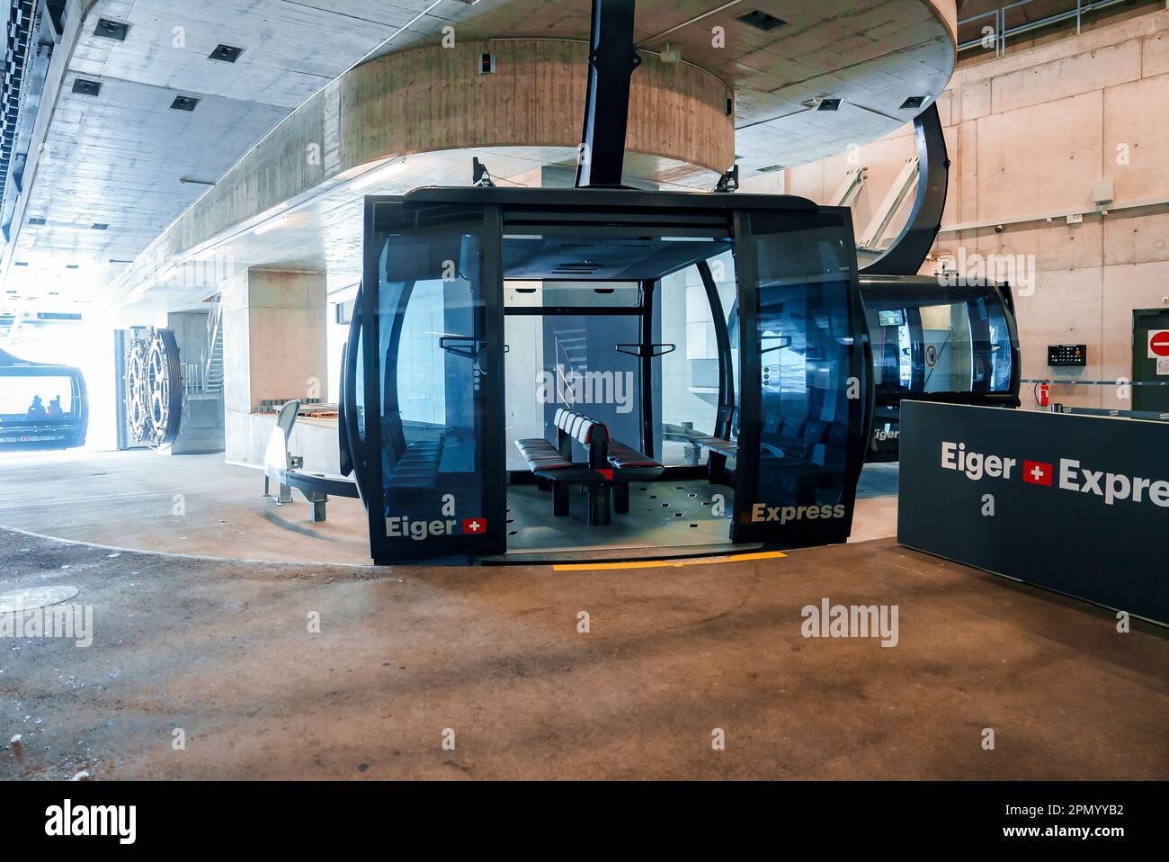 Empty gondola lift with open doors at modern Grindelwald terminal Stock ...