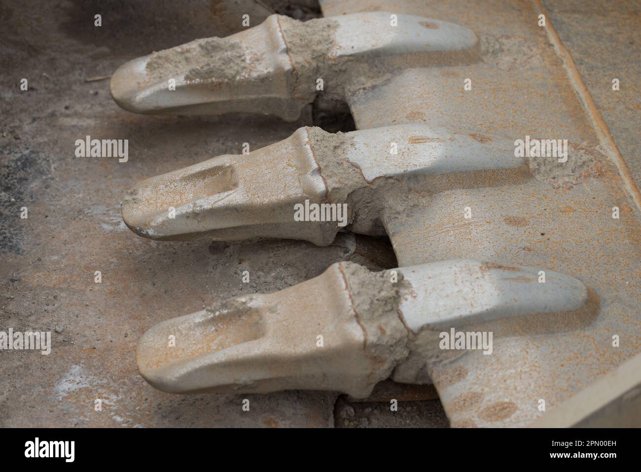 backhoe or excavator (?) bucket close up on teeth Stock Photo - Alamy