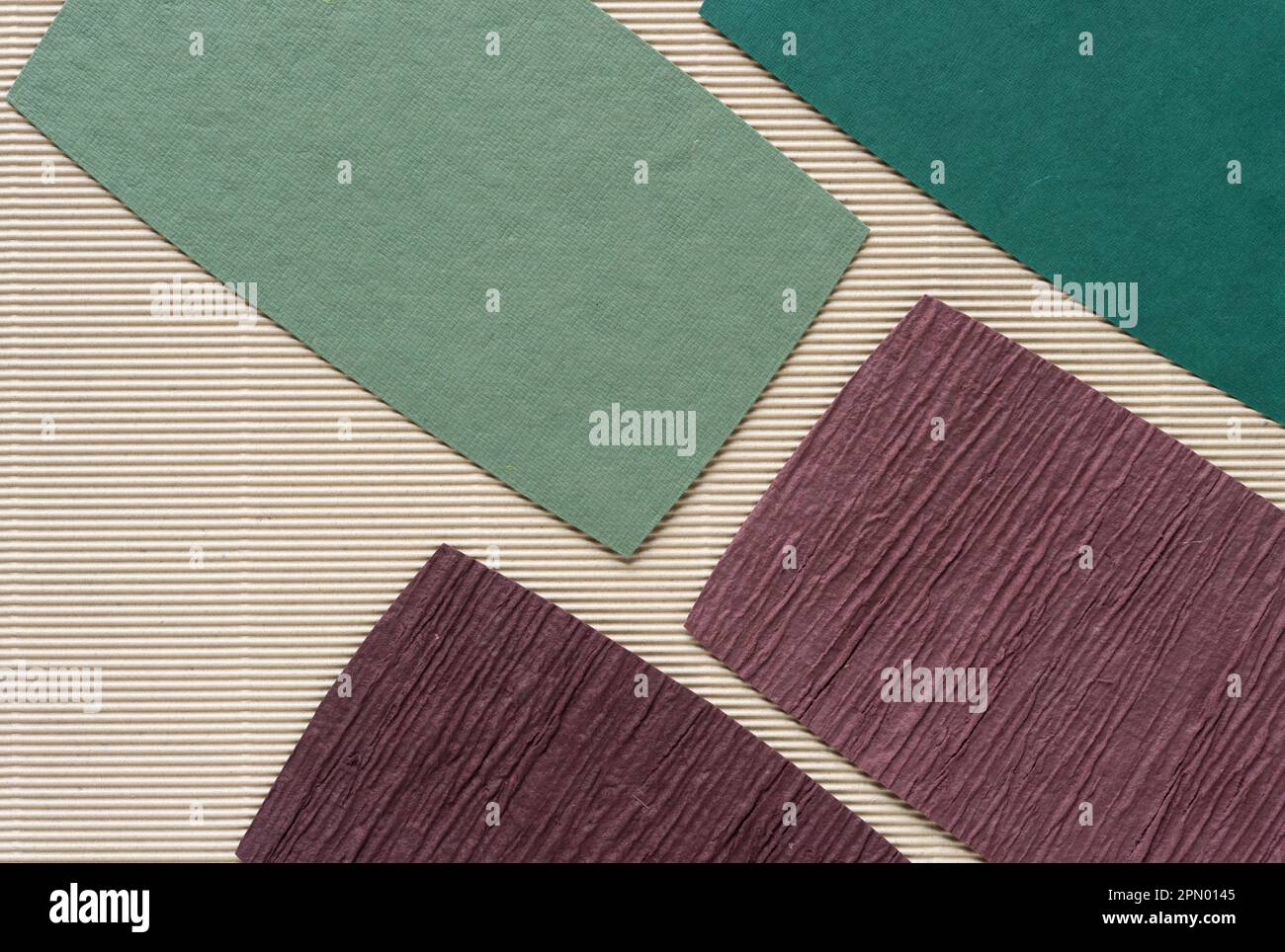 various paper cards with texture on beige corrugated cardboard paper ...