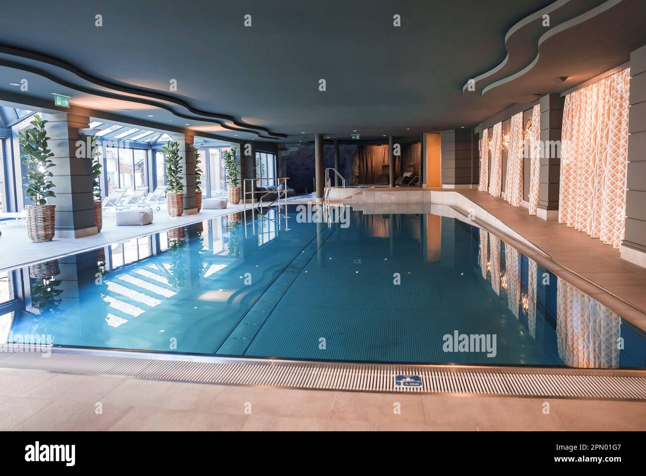 Interior of luxury fancy hotel with swimming pool Stock Photo - Alamy