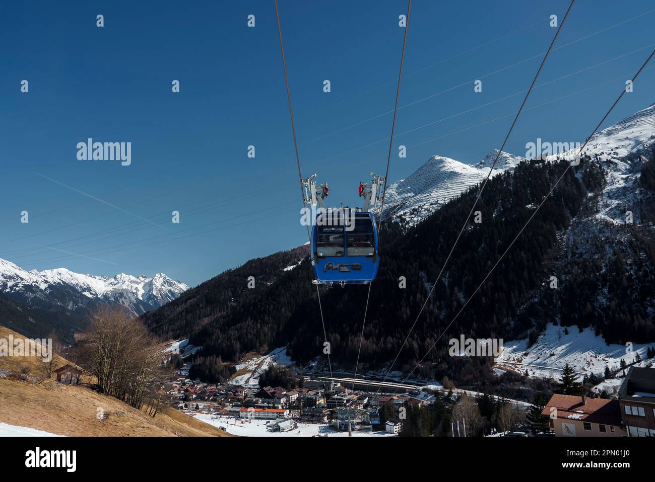 Cable car with snow landscape in background Stock Photo - Alamy