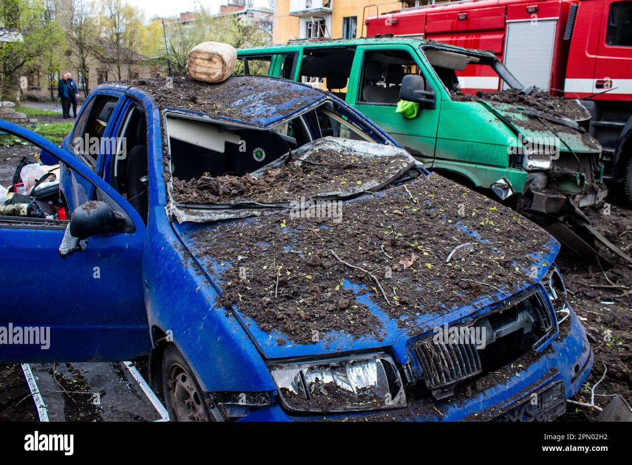 Destroyed car near the explosion. Aftermath of a missile attack on the ...