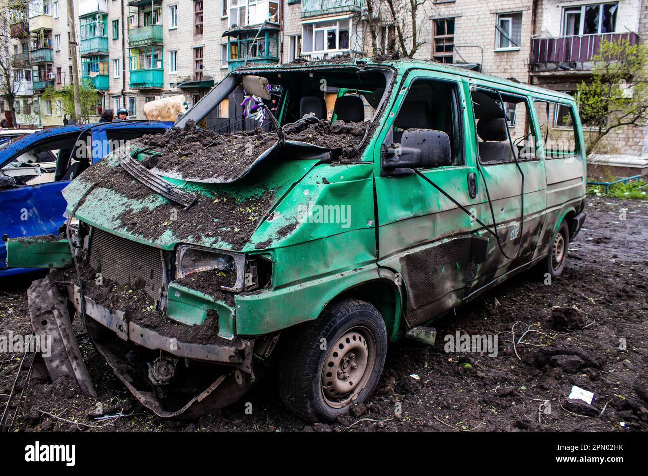 Destroyed car near the explosion. Aftermath of a missile attack on the ...