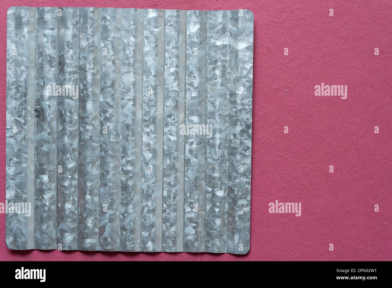 corrugated galvanized sheet metal shape (used for crafting) on rough ...