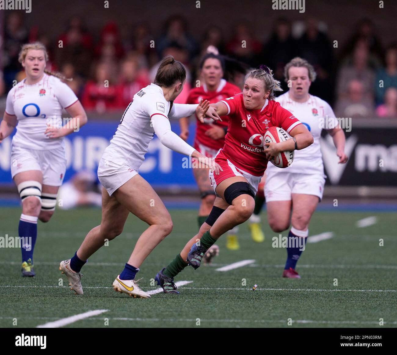 Cardiff,UK, 15 Apr 2023 Alex Callender (Wales) (R) hands off Holly ...