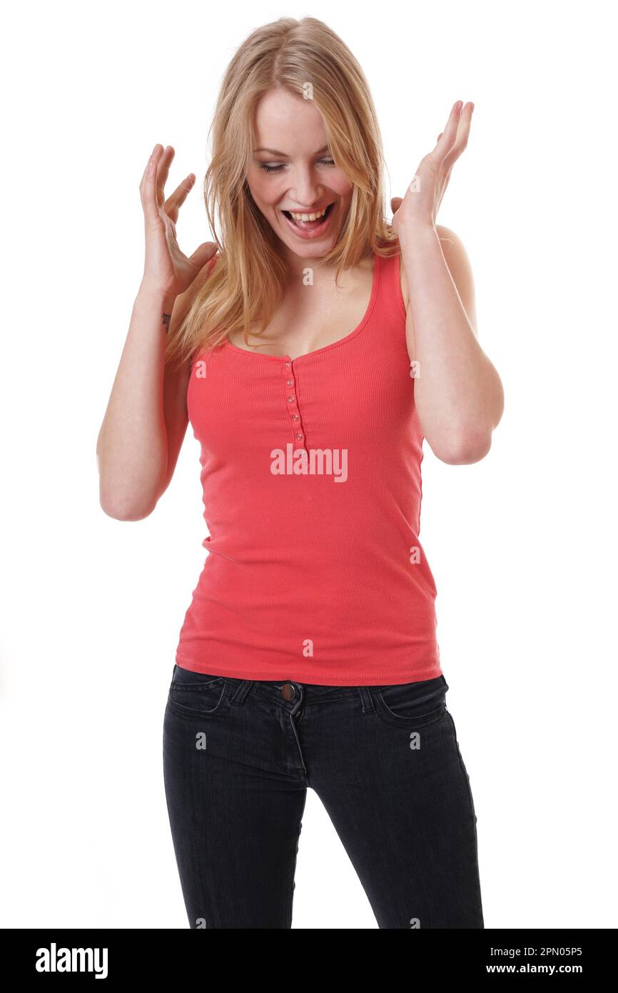 surprised young woman screaming of joy Stock Photo - Alamy