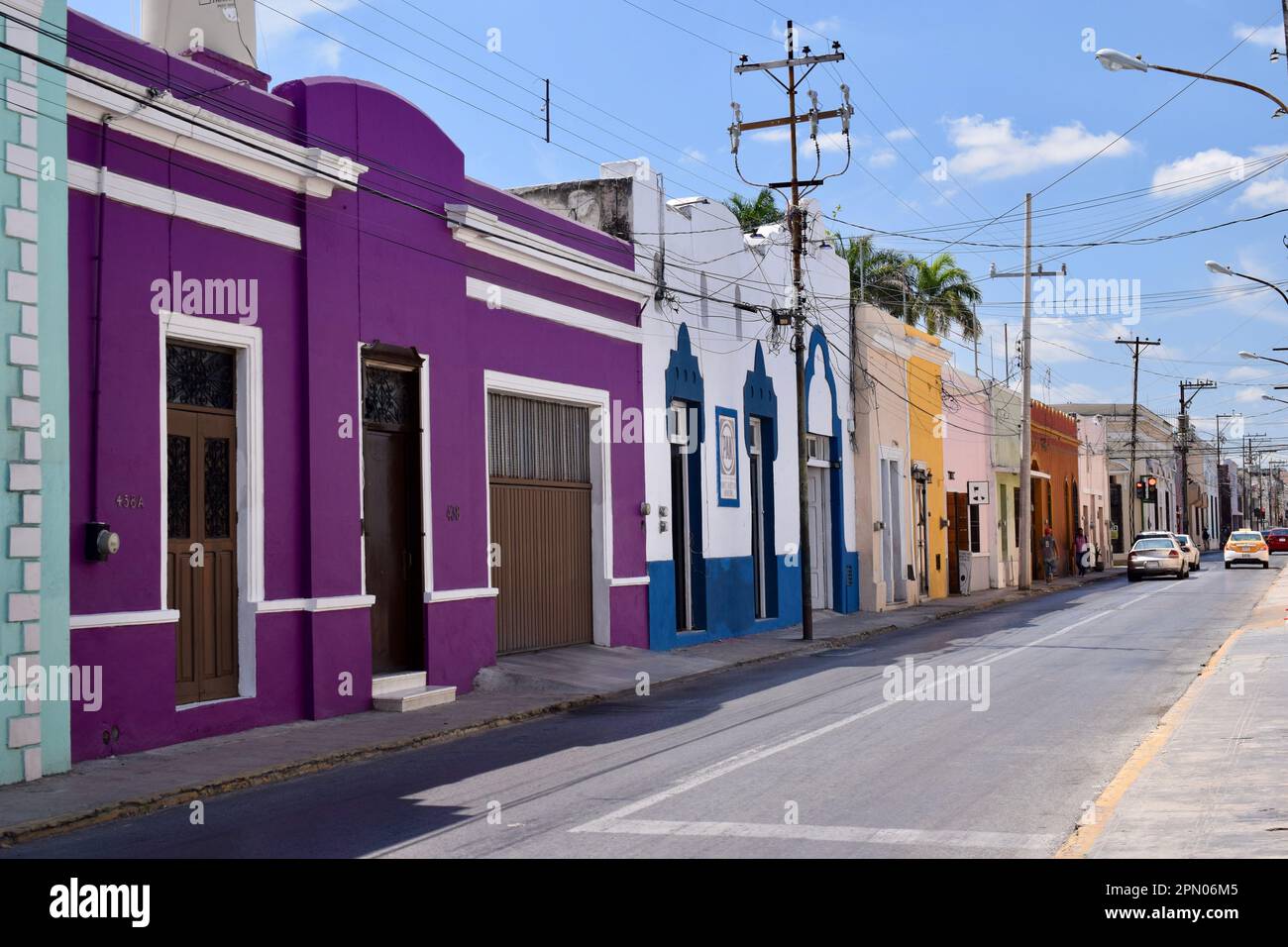 The colorful facades of restored buildings in the historic city of ...