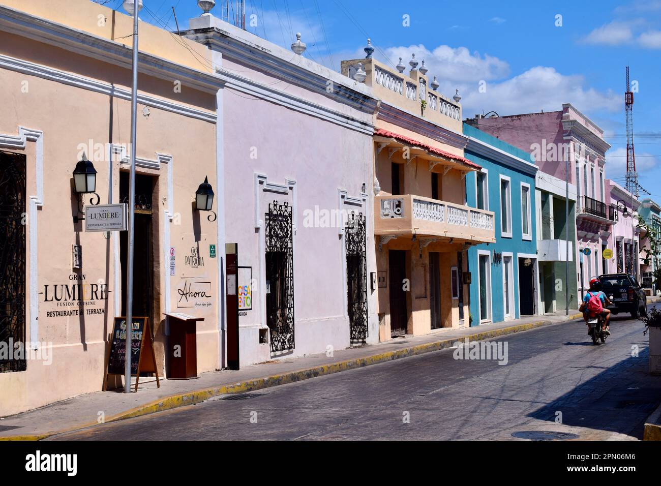 The colorful facades of restored buildings in the historic city of ...