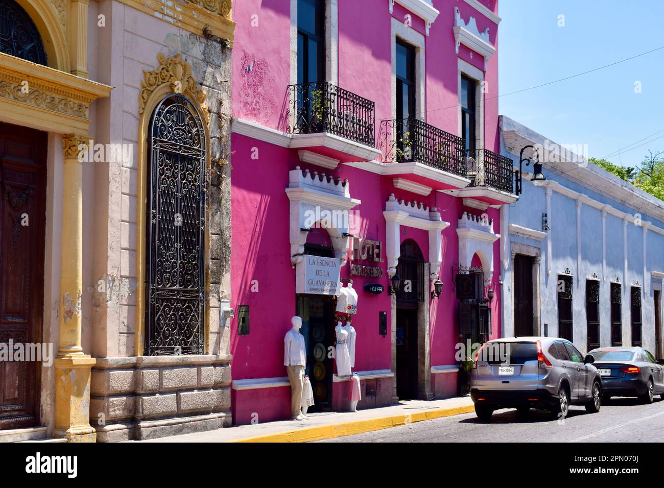 The colorful facades of restored, colonial buildings in the historic ...