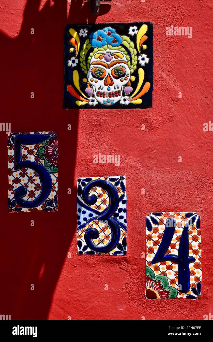 A house number painted on tiles in the historic center of Merida ...