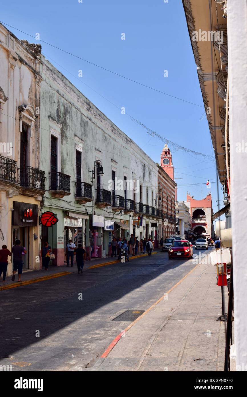 A street with colonial buildings in the historic city of Merida ...