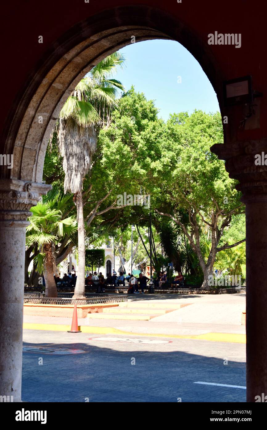 Plaza Grande as seen through an arch of the Municipal Palace in Merida ...