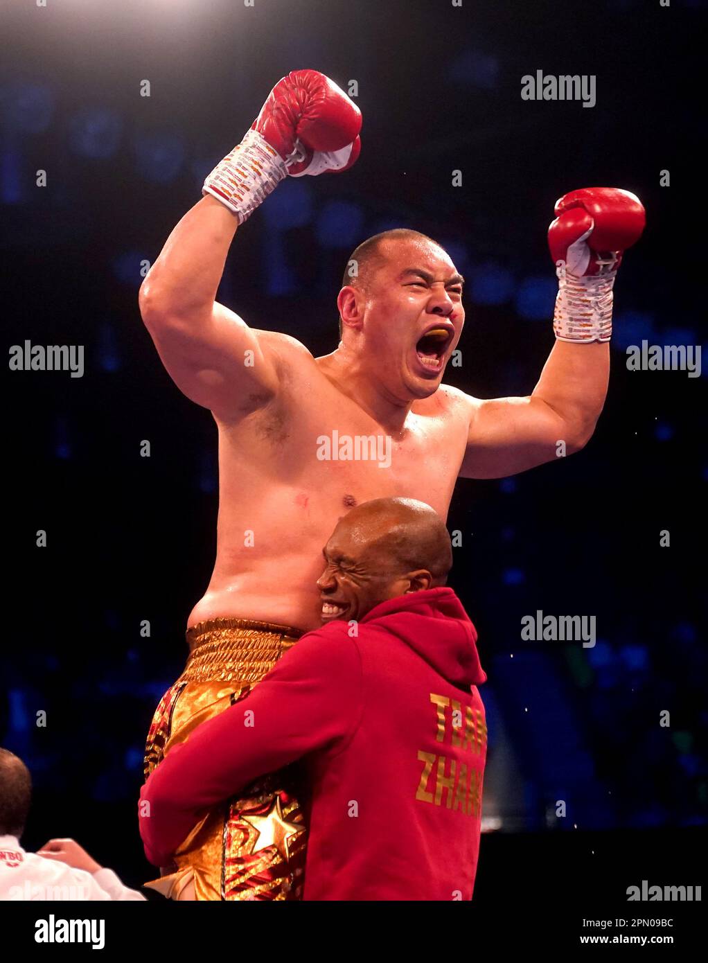 Zhilei Zhang celebrates after beating Joe Joyce to win their WBO ...