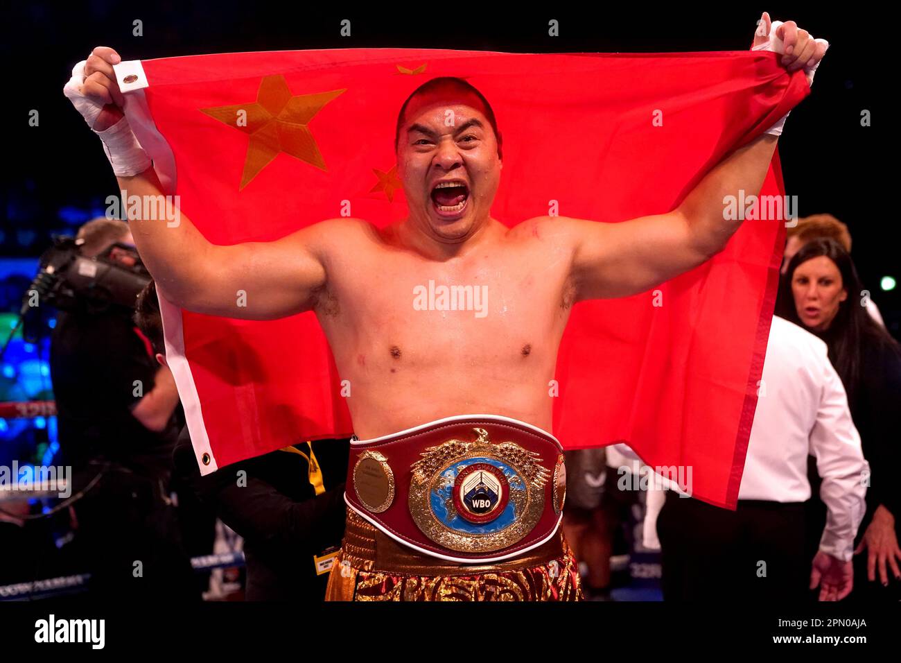 Zhilei Zhang celebrates after beating Joe Joyce to win their WBO ...