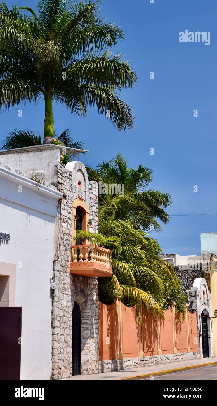An old building and balcony facing a bustling street in the historic ...