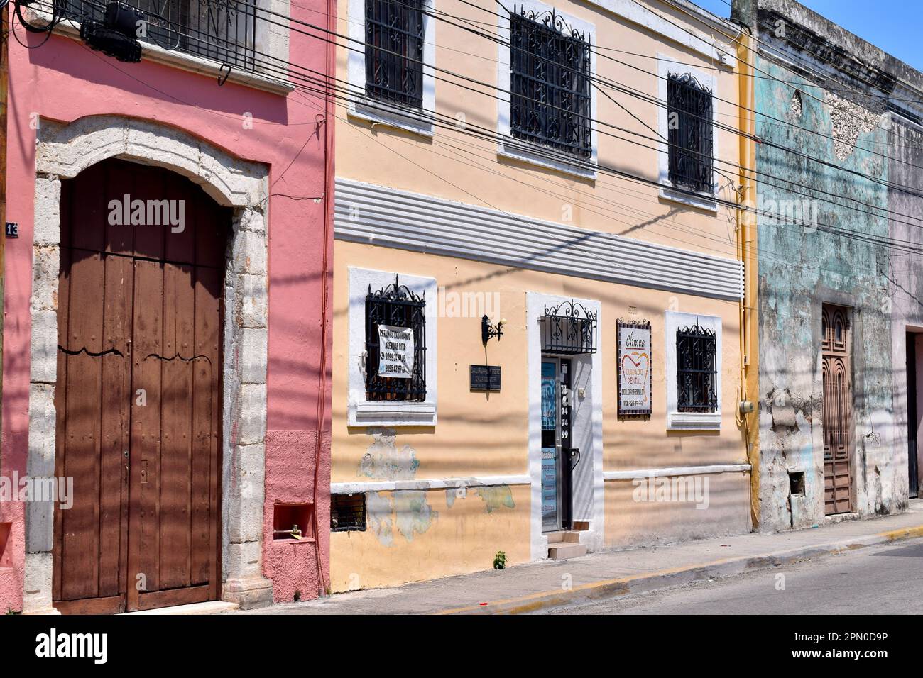 The colorful facades of historic buildings in Merida, Yucatan, Mexico ...