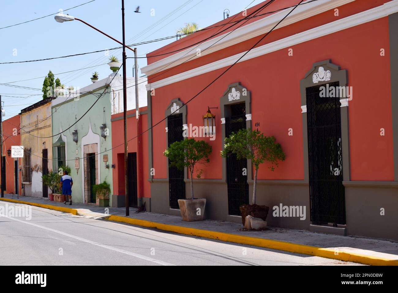 A street in Merida, Yucatan, Mexico, with colorful building facades ...