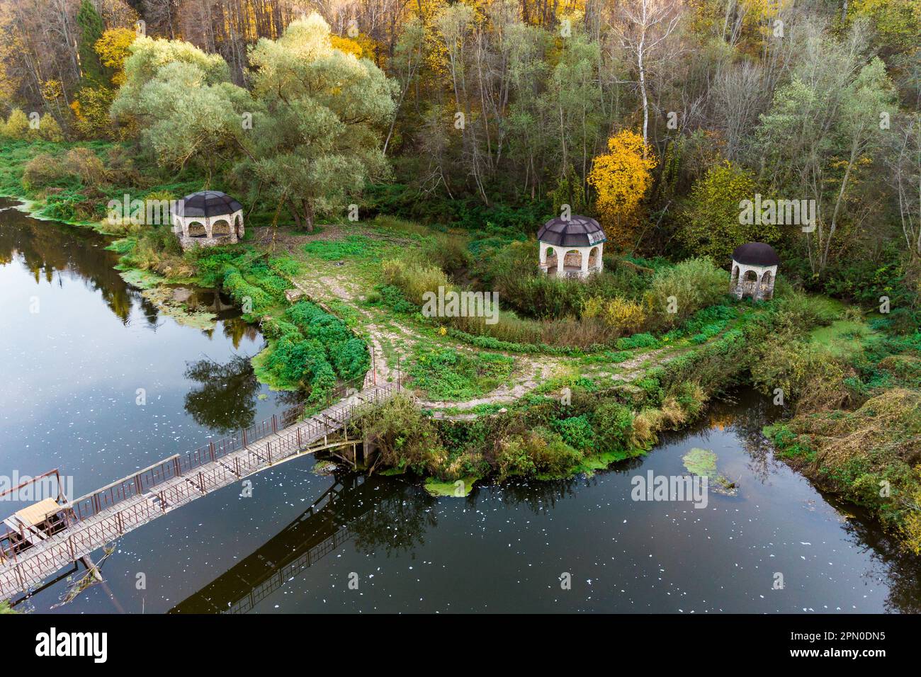 Rotunda on the shore of the reservoir to which a footbridge is thrown ...