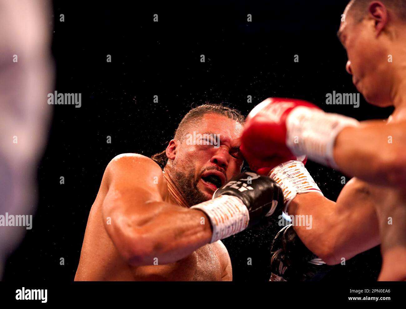 Joe Joyce (left) in action against Zhilei Zhang during their WBO ...