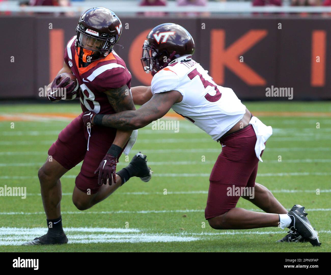 Virginia Tech running back Chance Black (28) turns up field while ...