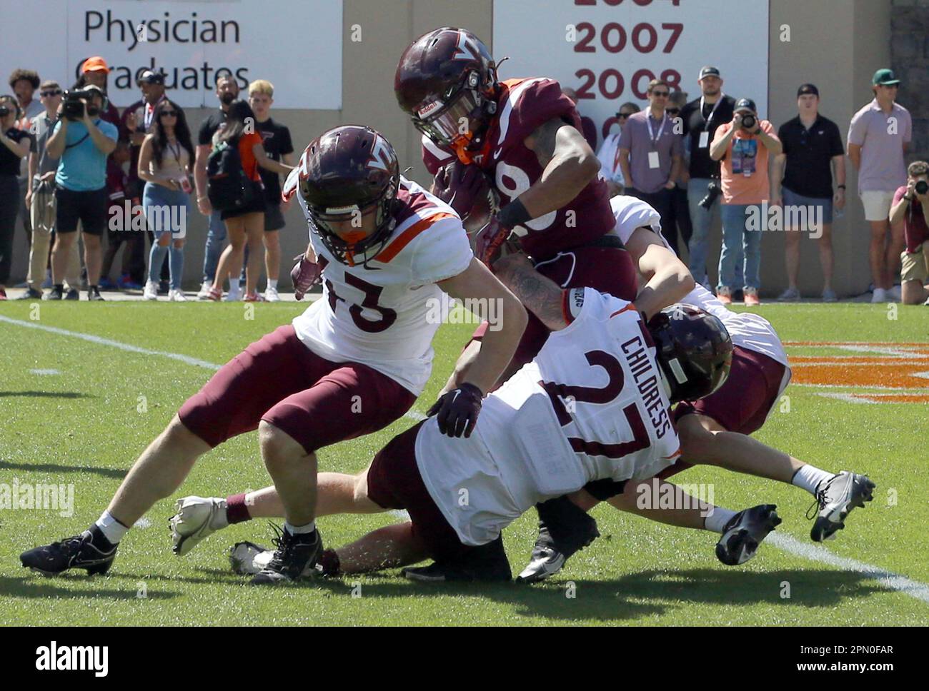 Virginia Tech running back Chance Black (28) rambles into the end zone ...