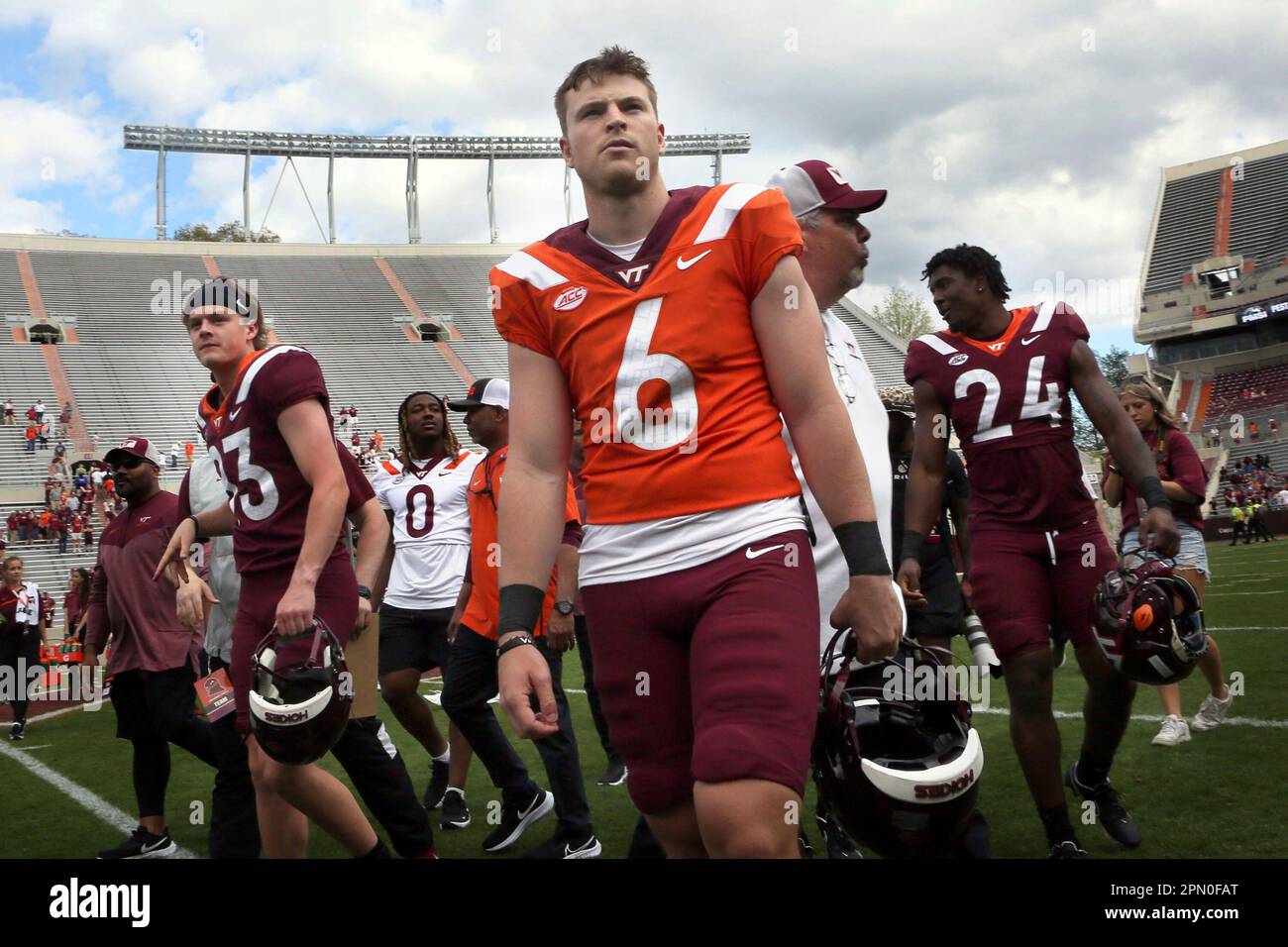 Virginia Tech quarterback Grant Wells (6) walks off the field after the ...