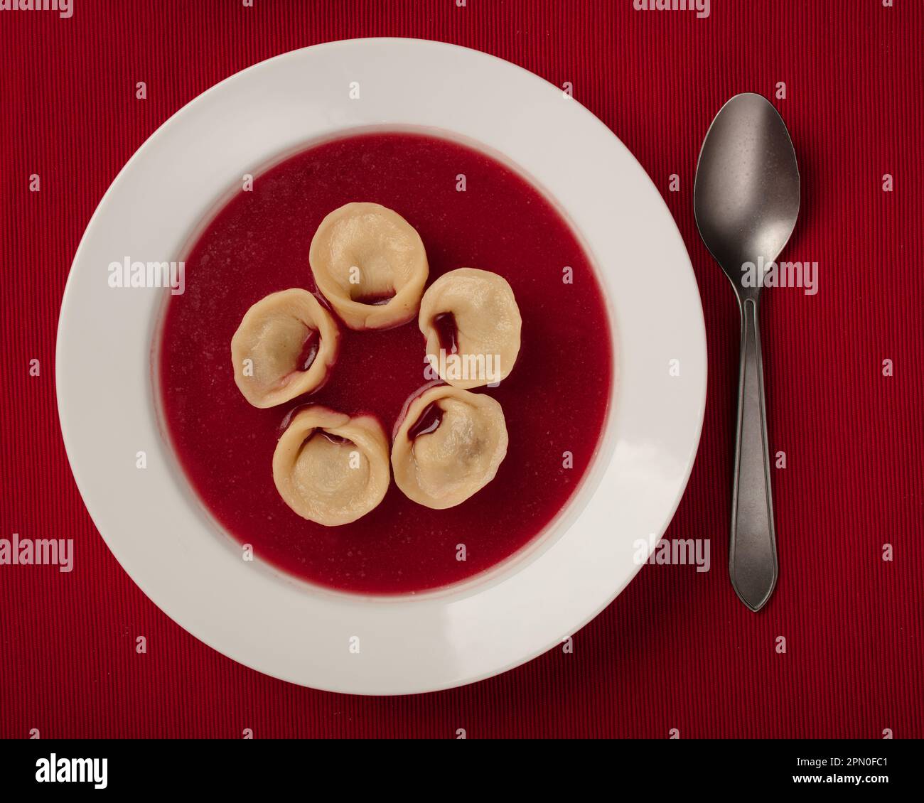 red borsch with ravioli Stock Photo - Alamy