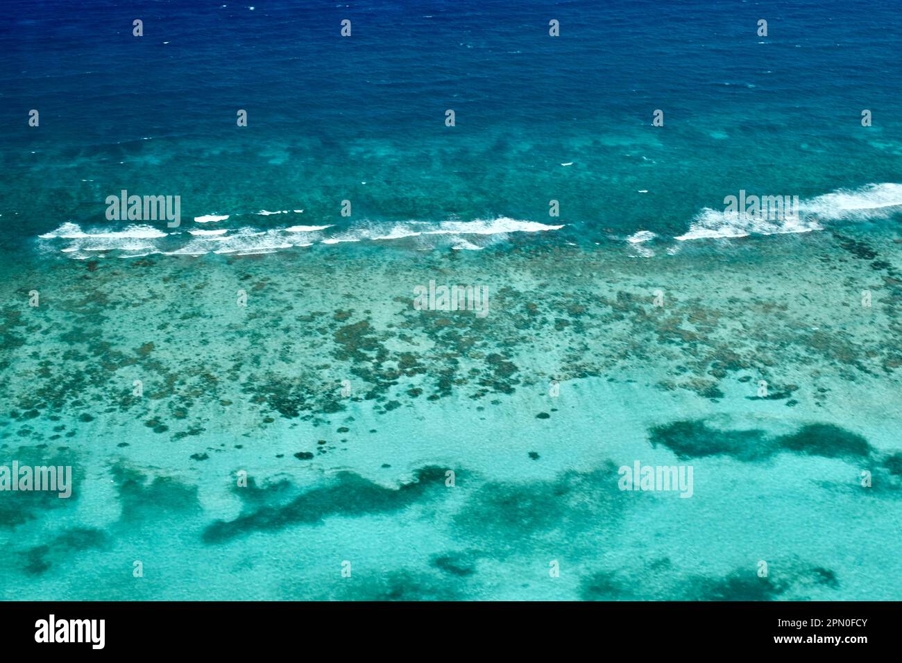 The Mesoamerican Barrier Reef System, as seen from a plane, in Belize ...