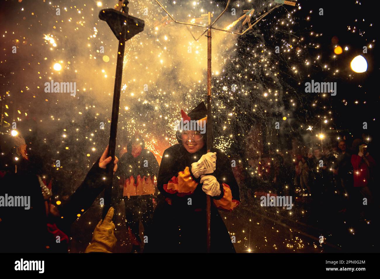 Barcelona, Spain. 15th Apr, 2023. Fire runners in devil costumes dance ...