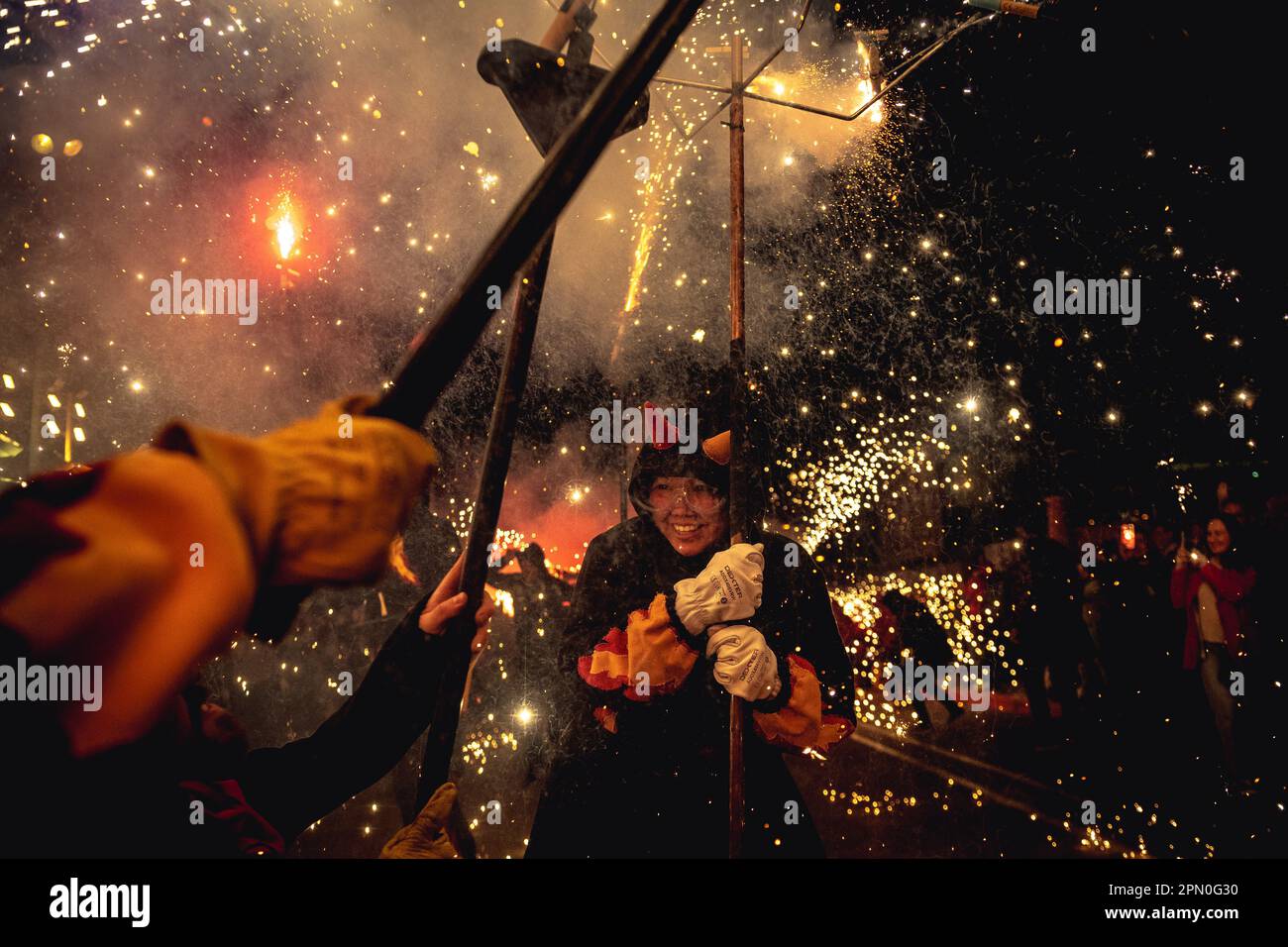 Barcelona, Spain. 15th Apr, 2023. Fire runners in devil costumes dance ...