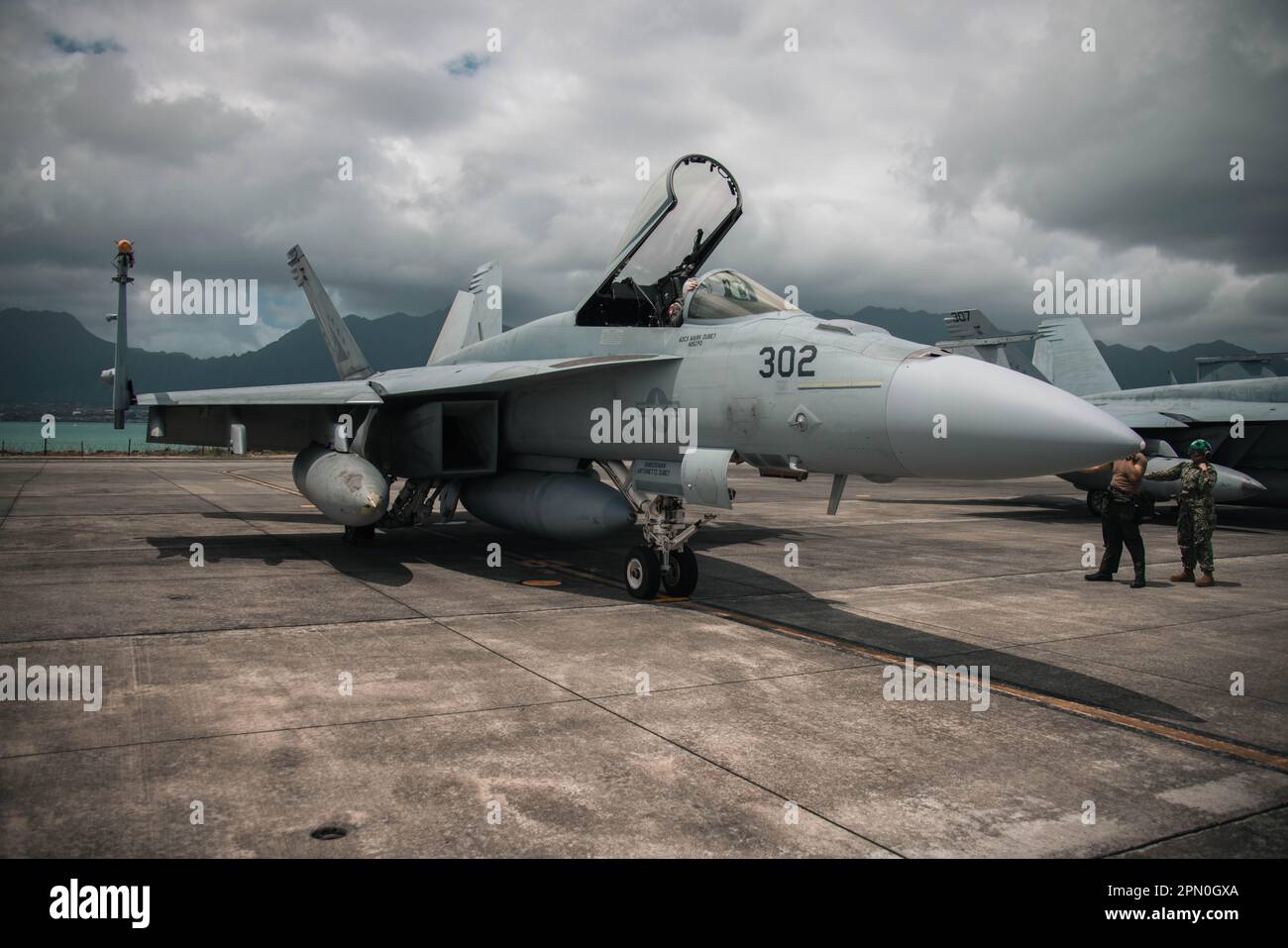 U.S. Sailors prepare an F/A-18F Super Hornet, assigned to Strike ...