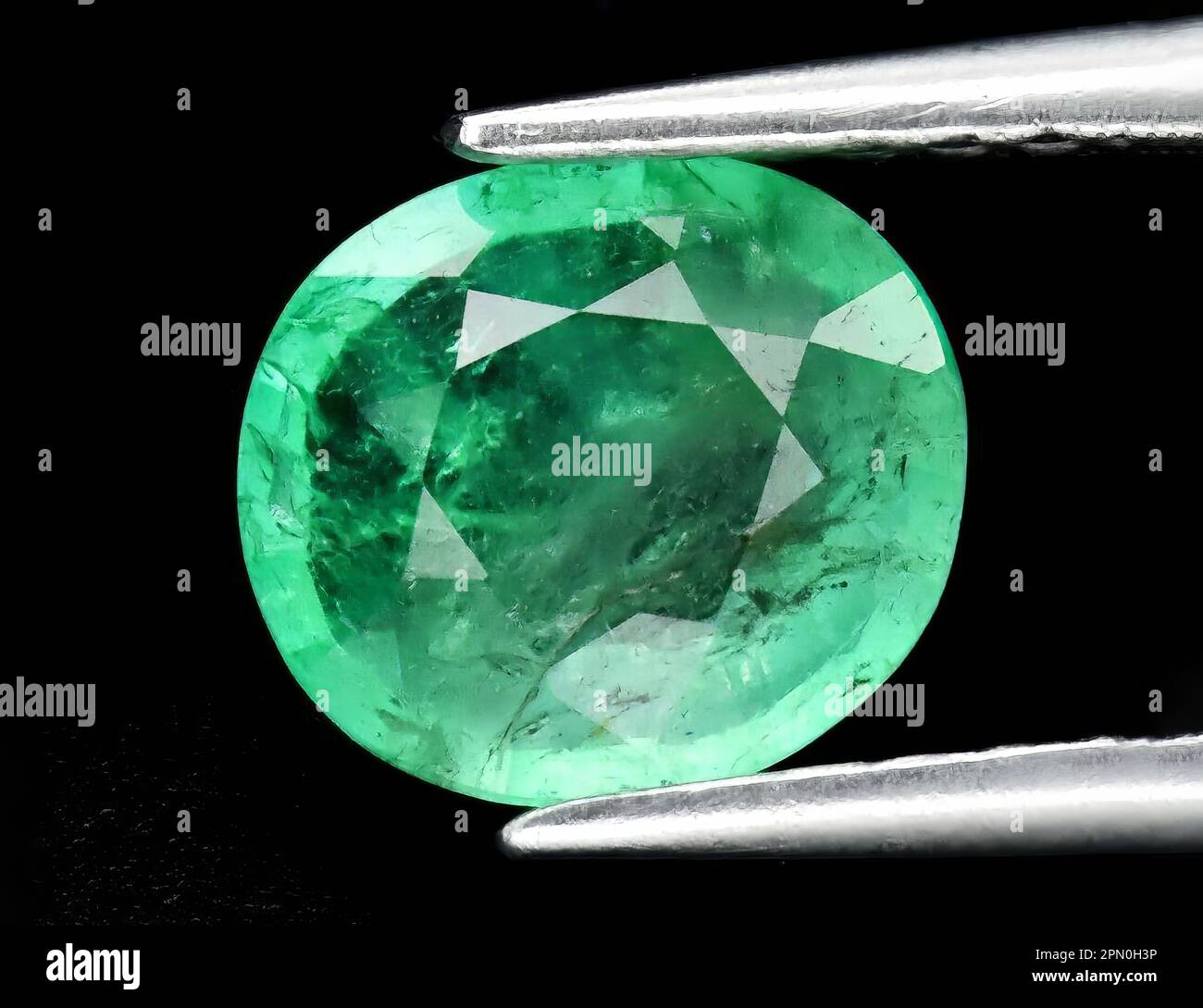 Natural gem green emerald on black background Stock Photo - Alamy