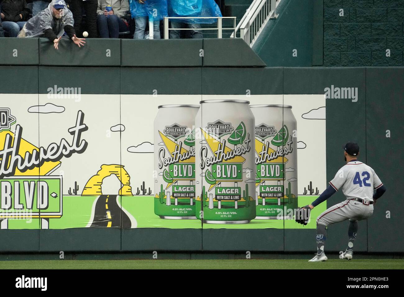 Atlanta Braves center fielder Eli White chases after an RBI double hit ...