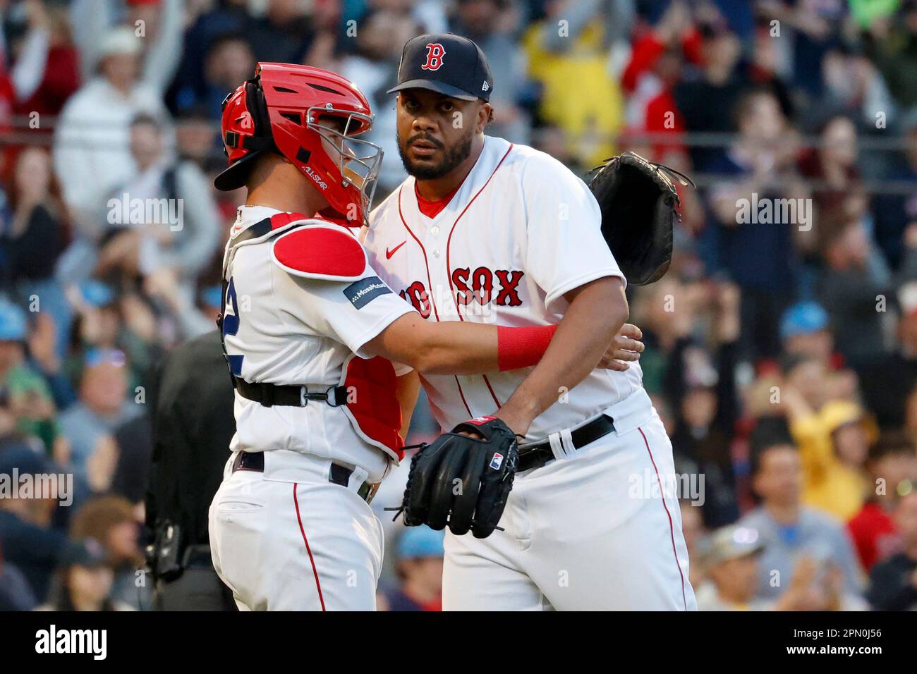 Boston Red Sox catcher Reese McGuire, left, congratulates closing ...
