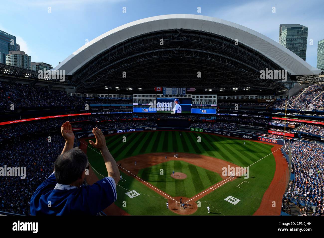 Toronto, Canada. 15th Apr, 2023. Fans cheer after Toronto Blue Jays ...