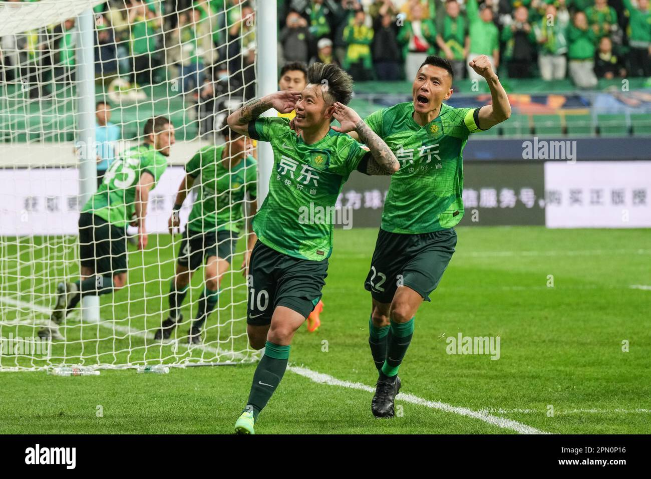 Beijing, China. 15th Apr, 2023. Zhang Xizhe (L) of Beijing Guoan ...