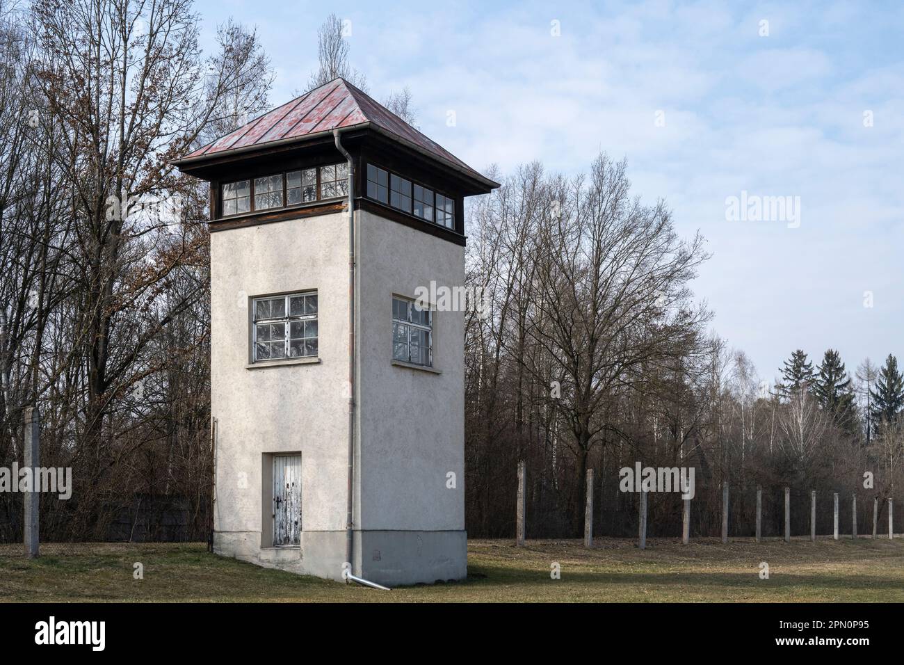view of a guard tower at Dachau concentration camp from inside the camp ...
