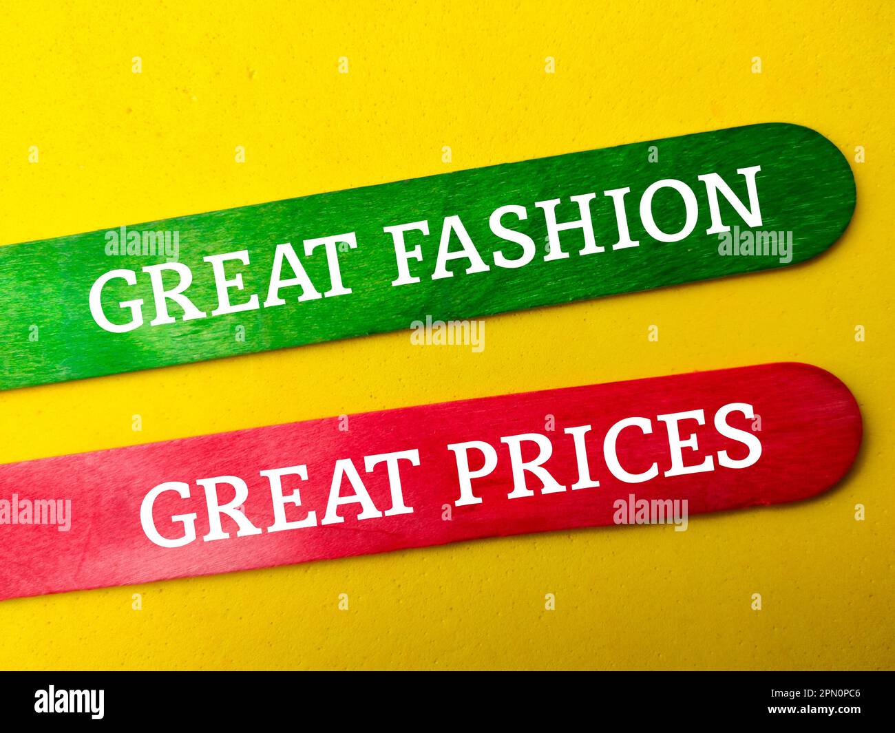 Colored wooden stick with the word GREAT FASHION GREAT PRICES Stock ...