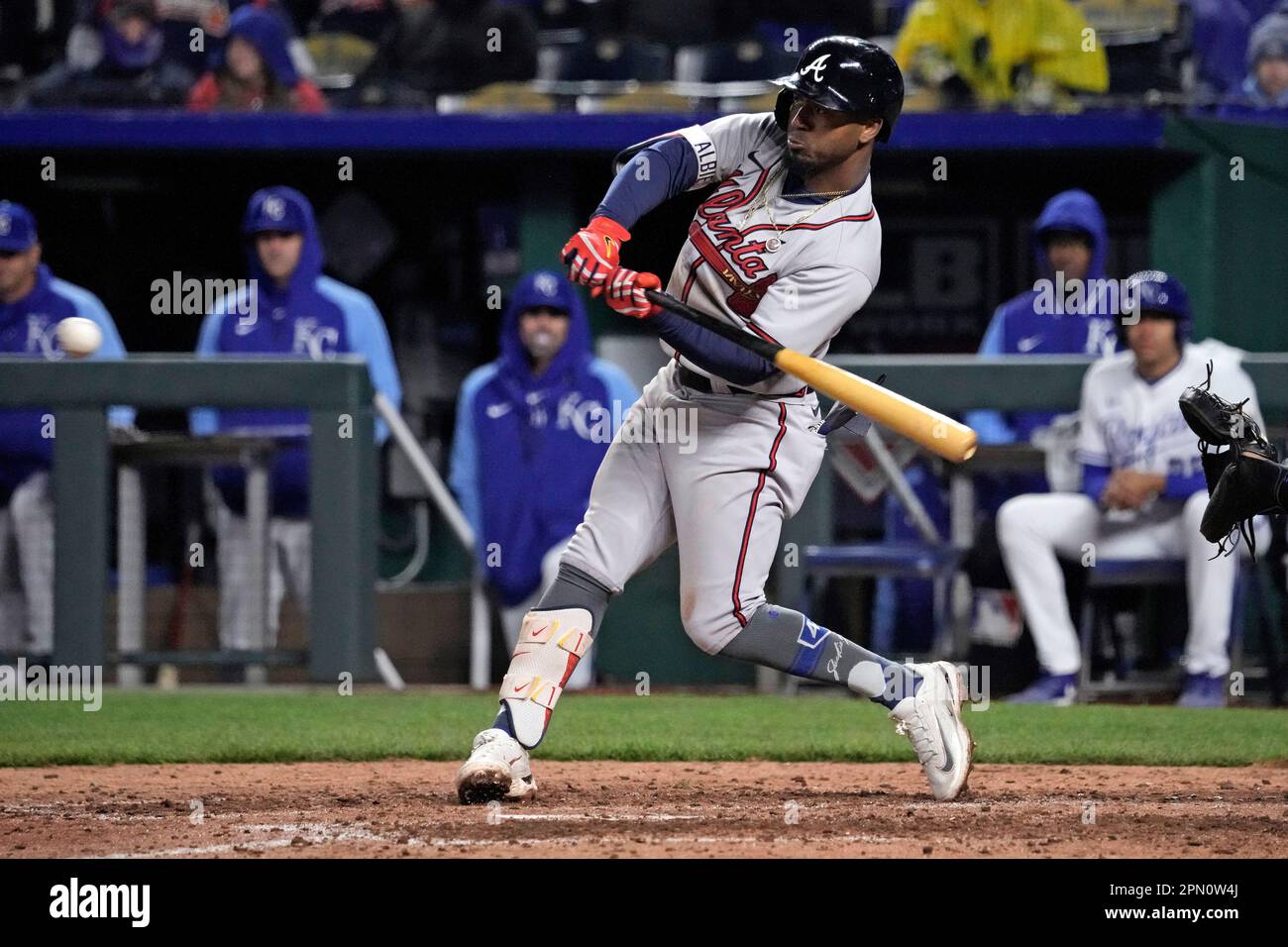 Atlanta Braves' Ozzie Albies hits a two-run single during the eighth inning of a baseball game ...