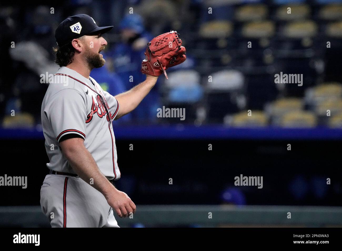 Atlanta Braves relief pitcher Kirby Yates celebrates after a baseball ...