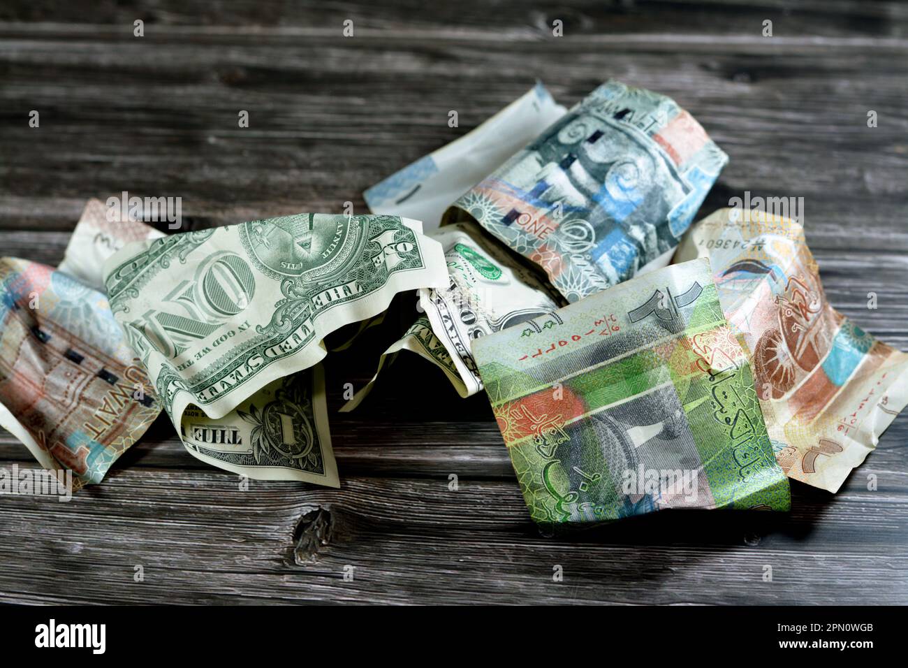 Wrinkled and crumpled Kuwaiti half, quarter and one KWD dinar bills ...
