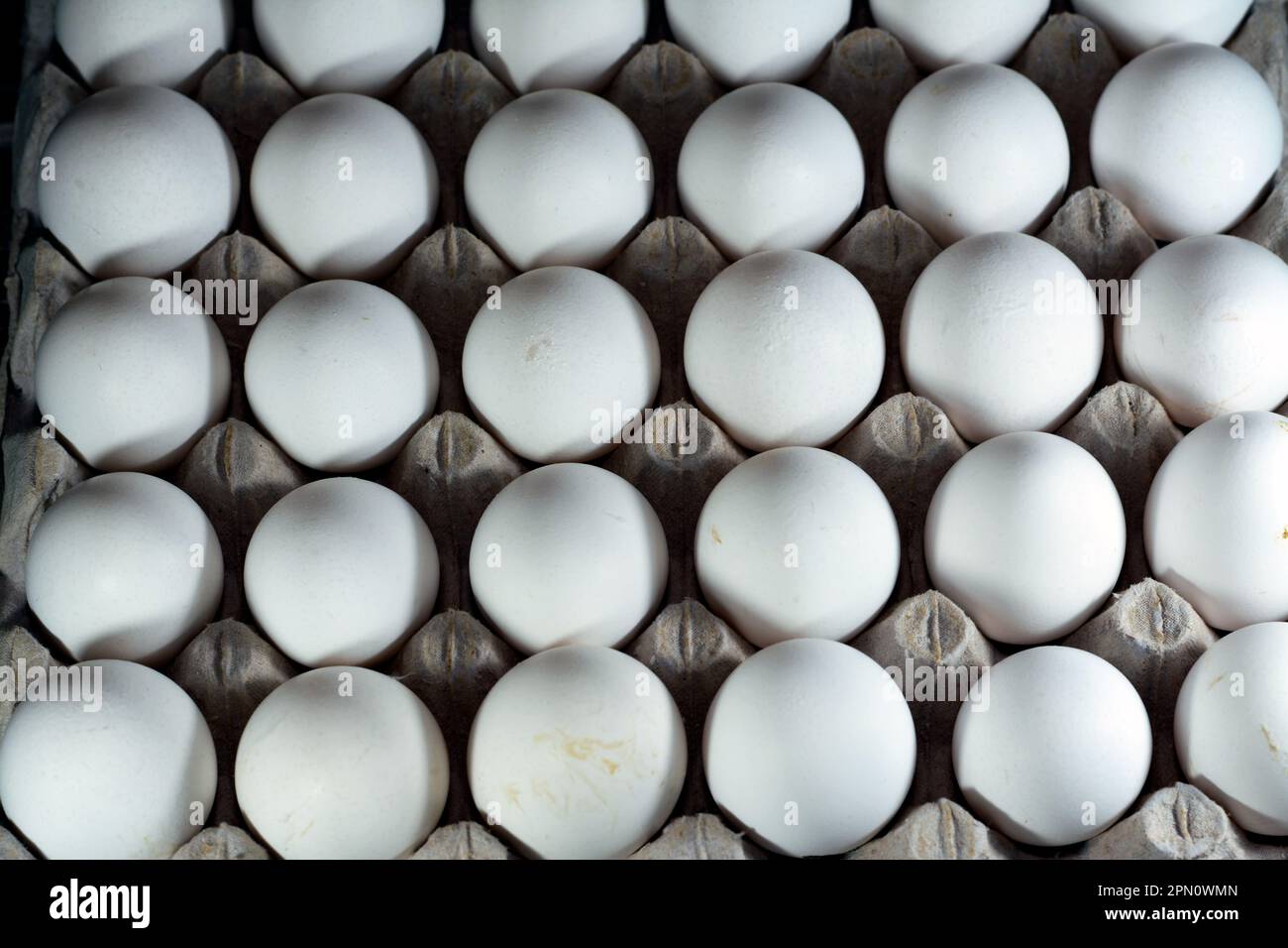 Pile of organic fresh and raw hen chicken eggs, stack of eggs isolated ...