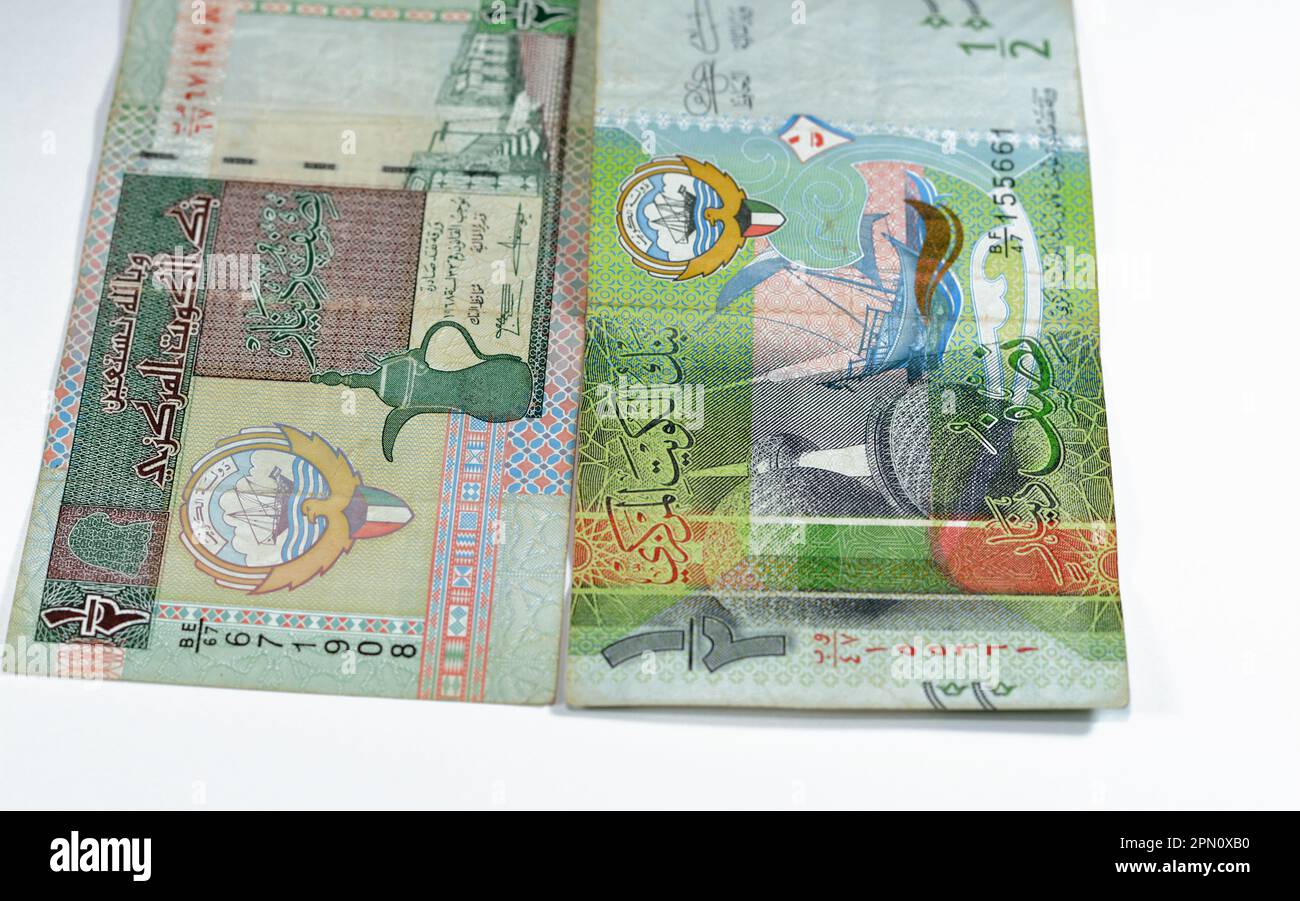 Old and new Kuwaiti half dinar bill banknotes money coat of arms of ...